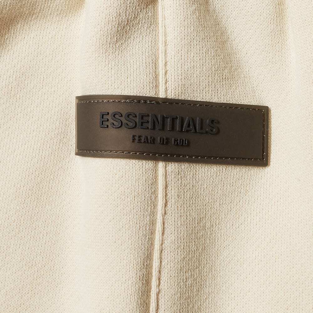 Fear of God ESSENTIALS Kids Logo Sweat Pant in Egg Shell Fear Of God ...