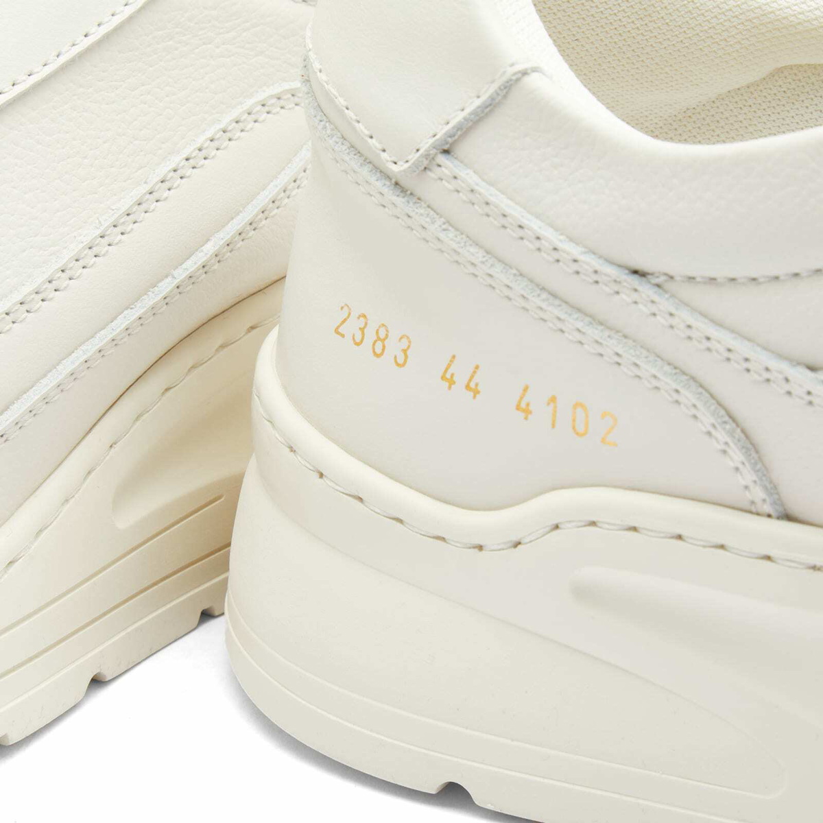 Common Projects Men's Track 90 Sneakers in Bone White Common Projects