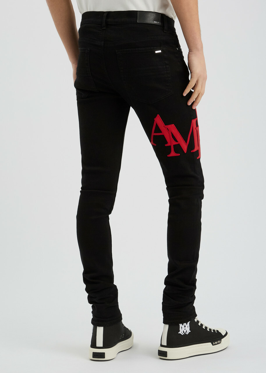 Amiri Staggered Logo Skinny Jeans Black Red Amiri