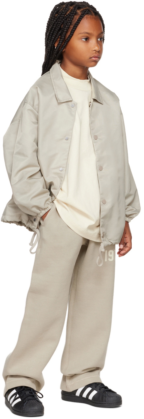 Essentials Kids Gray '1977' Coaches Jacket Essentials
