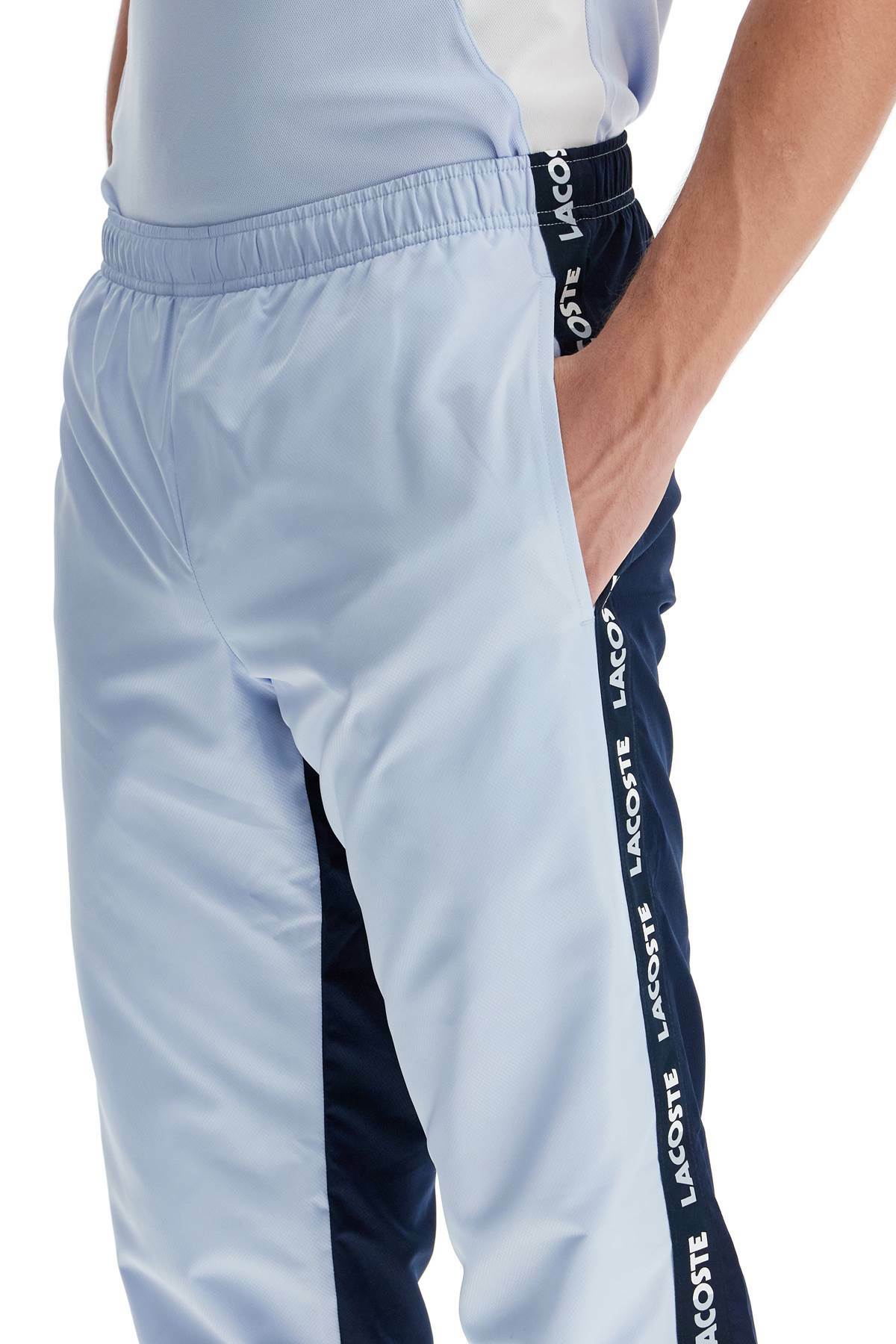 LACOSTE with logo and color block design Blue Lacoste
