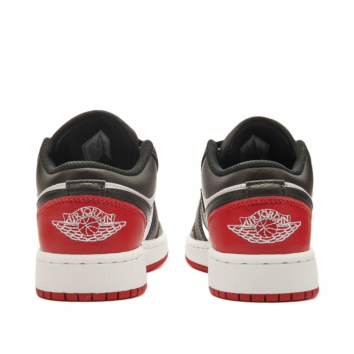 Air Jordan 1 Low GS Sneakers in White/Black Nike Jordan Brand