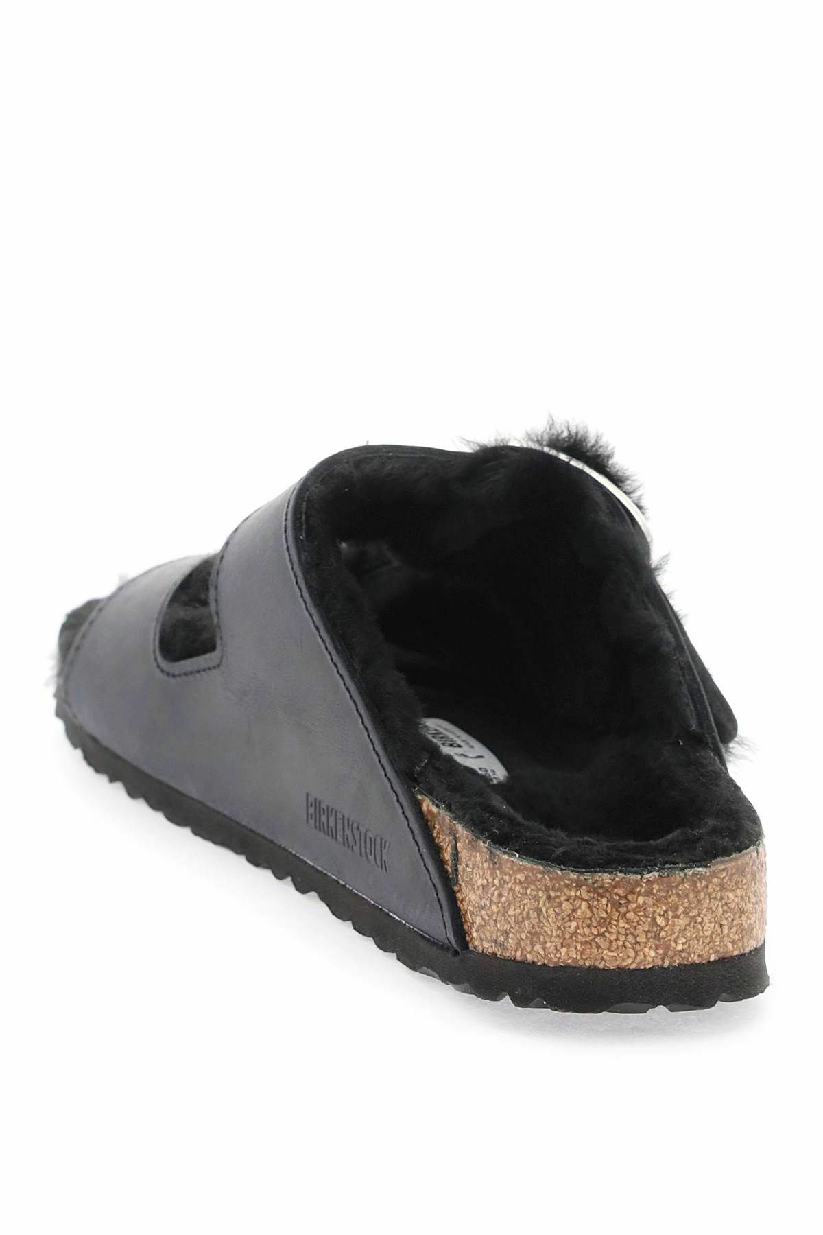 BIRKENSTOCK arizona big buckle slides in teddy Black Birkenstock