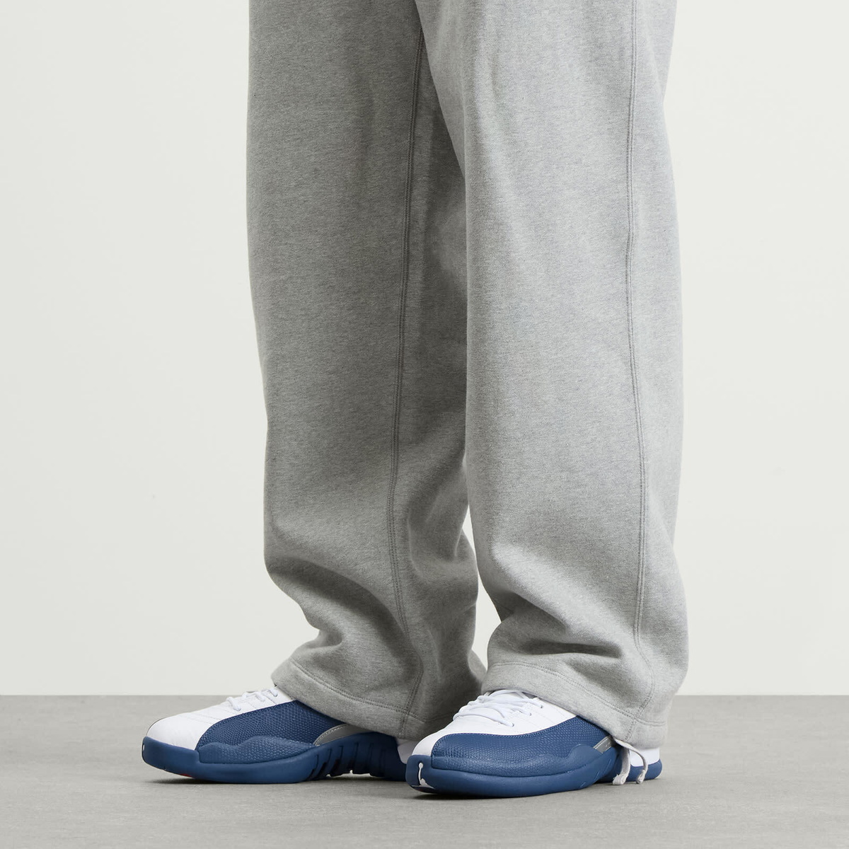 Air Jordan Men's 12 Retro Sneaker in White/Blue/Red Nike Jordan Brand