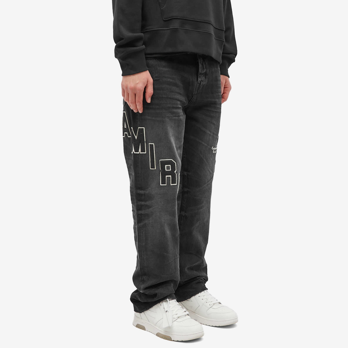 AMIRI Men's Hockey Logo Straight Jeans in Faded Black Amiri AMIRI Men's Hockey Logo Straight Jeans in Faded Black Amiri