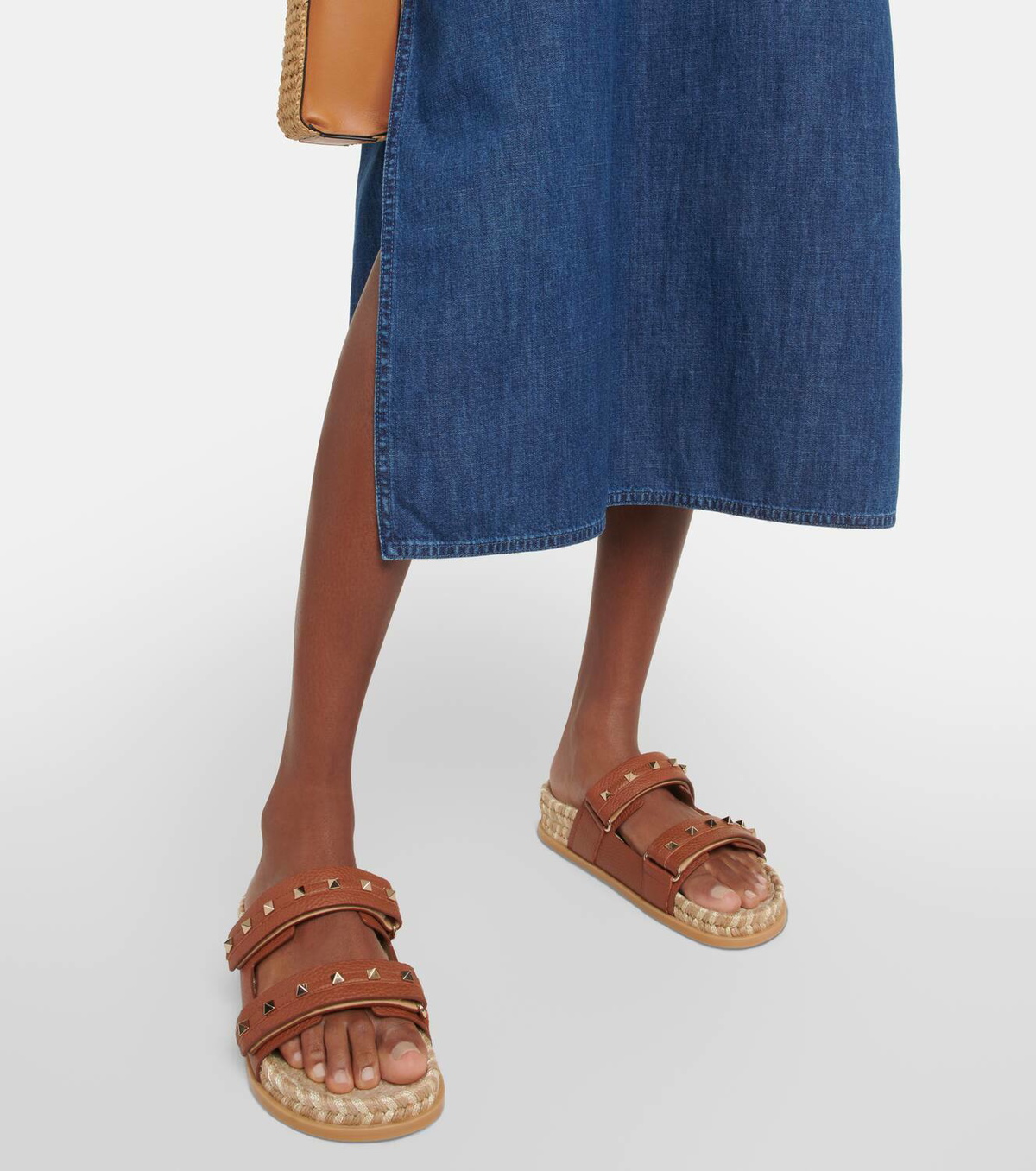 Valentino Garavani Rockstud leather and raffia slides Valentino Garavani