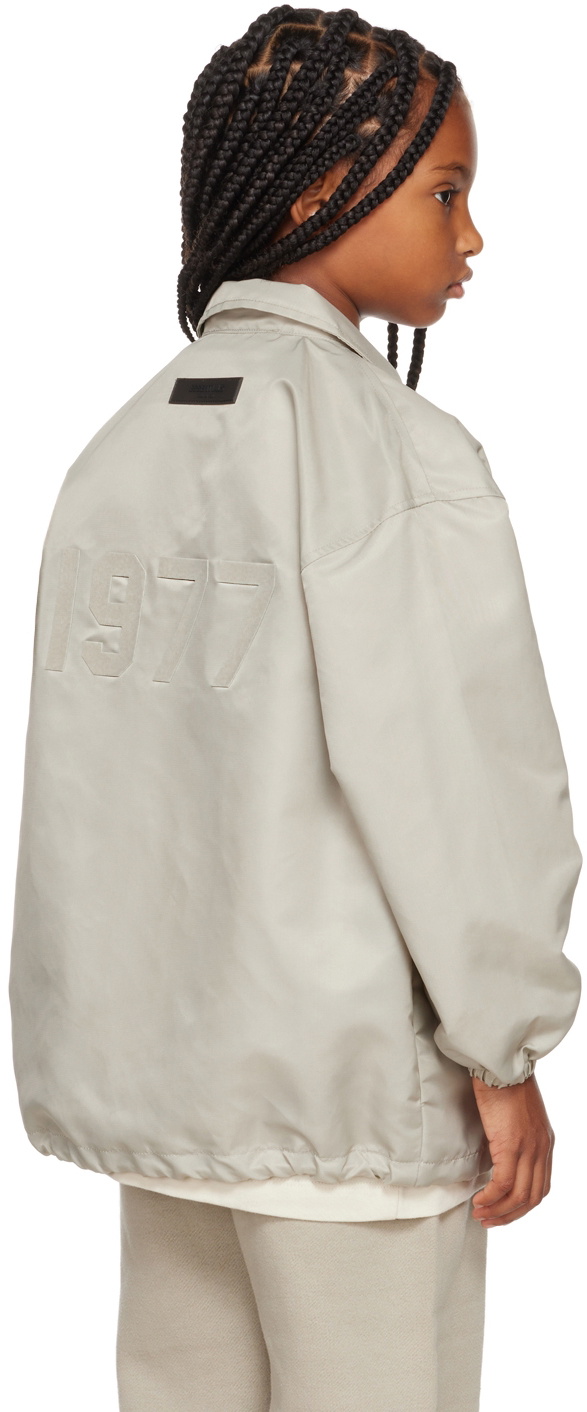 Essentials Kids Gray '1977' Coaches Jacket Essentials