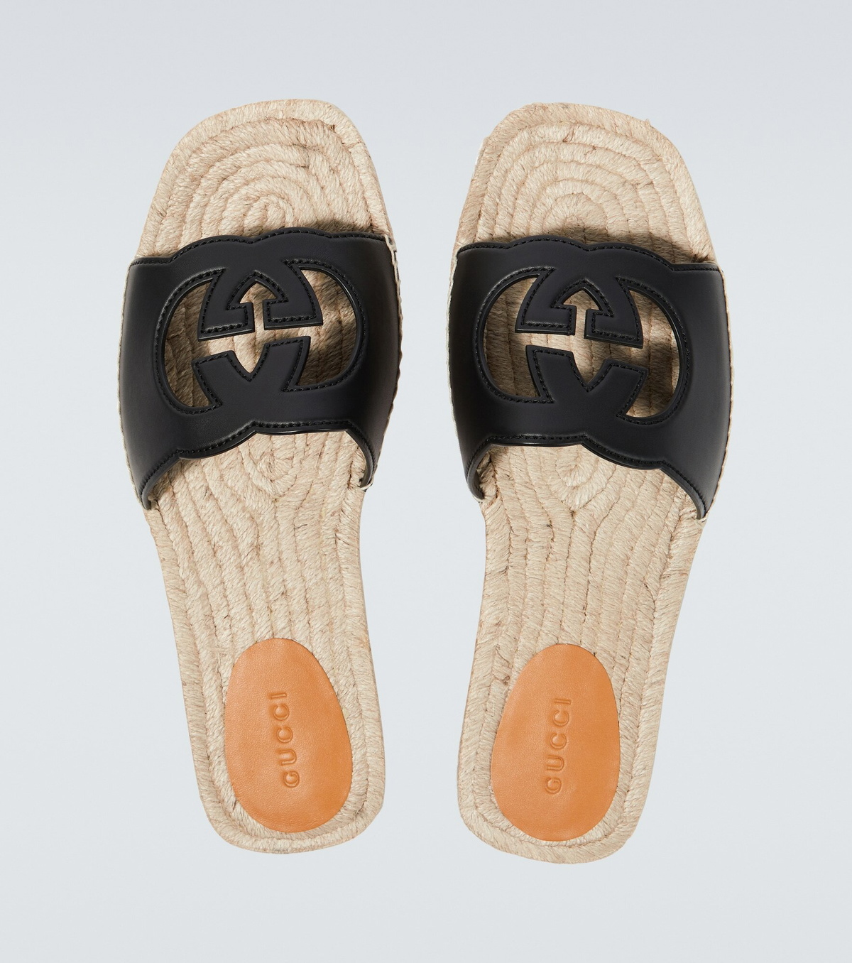 Gucci - Interlocking G leather and jute slides Gucci
