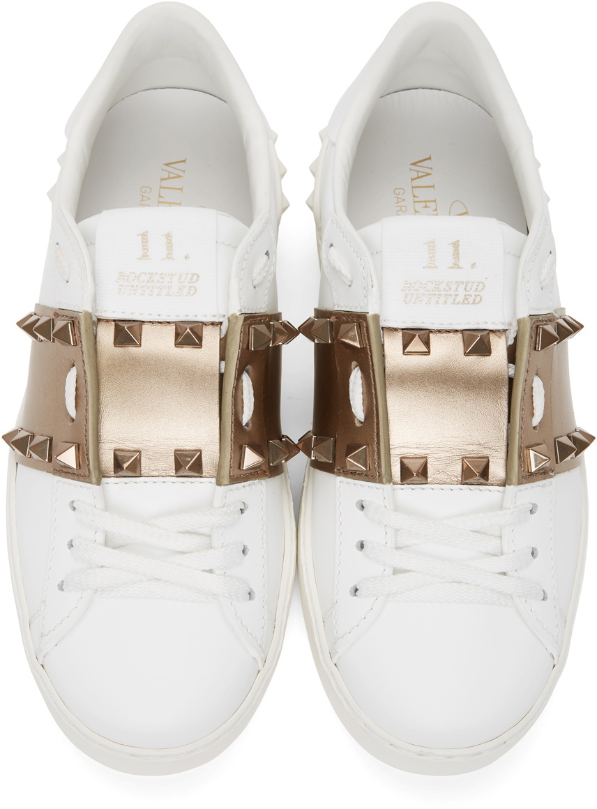Valentino Garavani White & Bronze Rockstud Open Sneakers Valentino Garavani