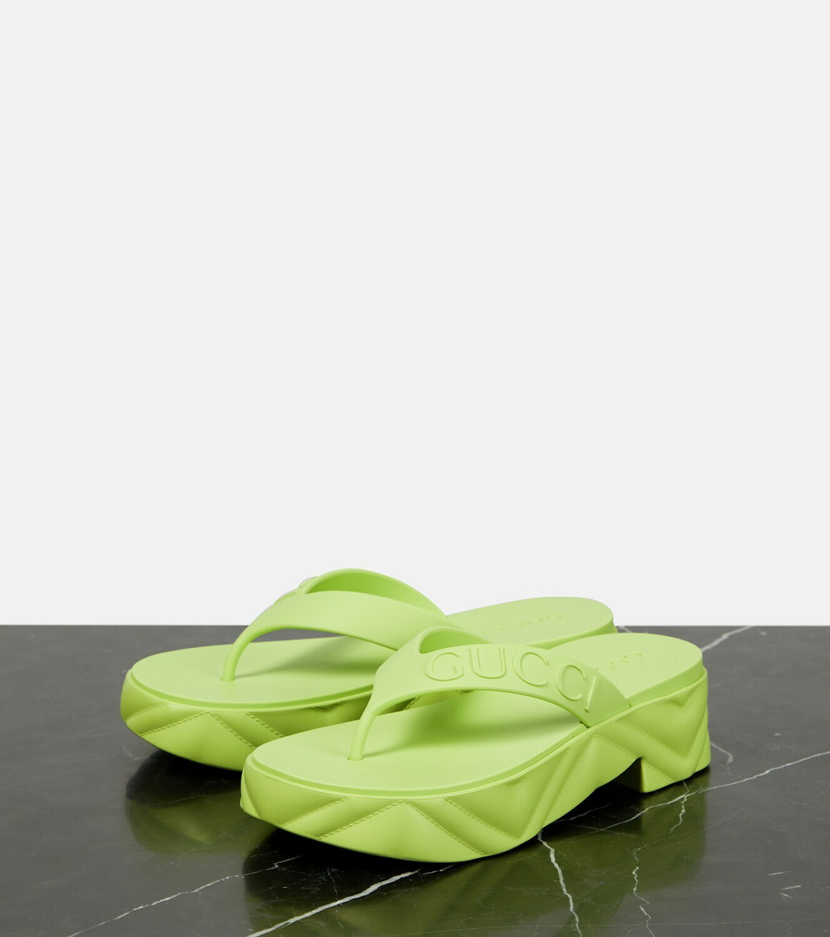 Gucci Logo embossed rubber slides Gucci