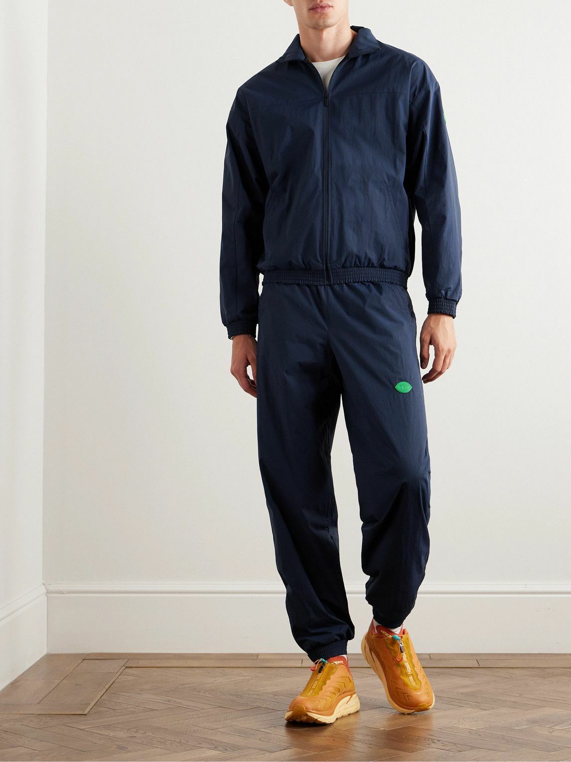 DISTRICT VISION - Logo-Appliquéd Tapered Nylon Trousers - Blue District ...