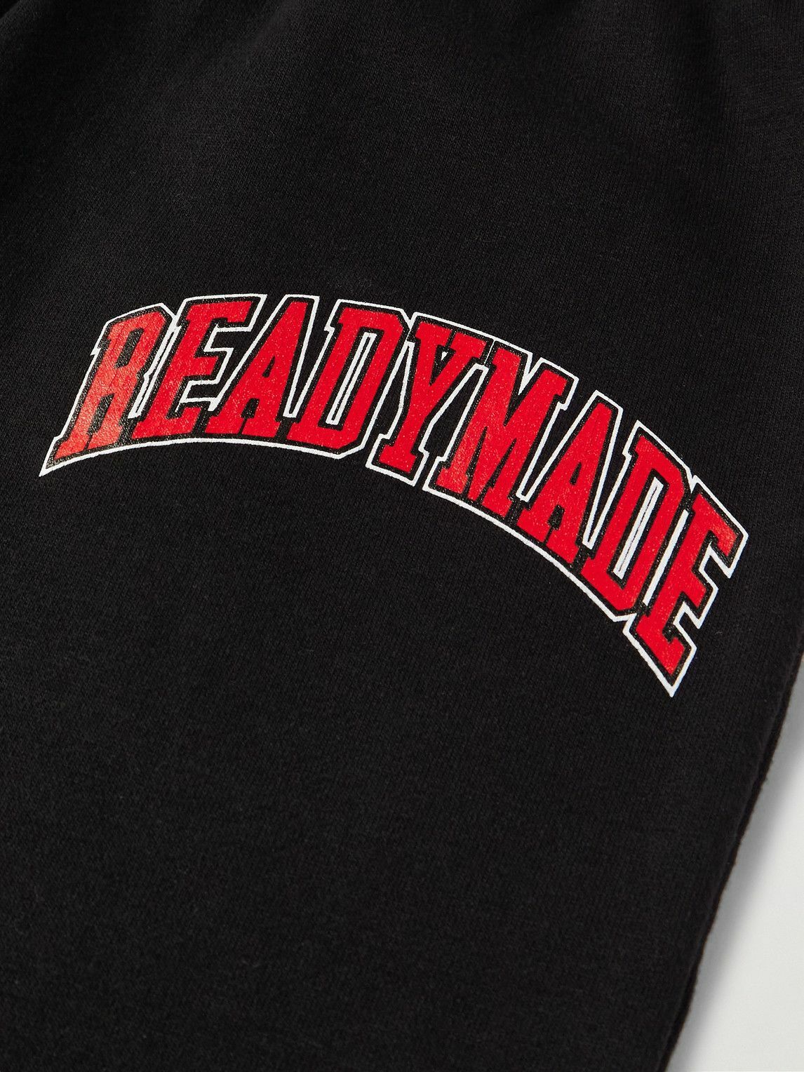 READYMADE - Tapered Logo-Print Cotton-Blend Jersey Sweatpants - Black ...