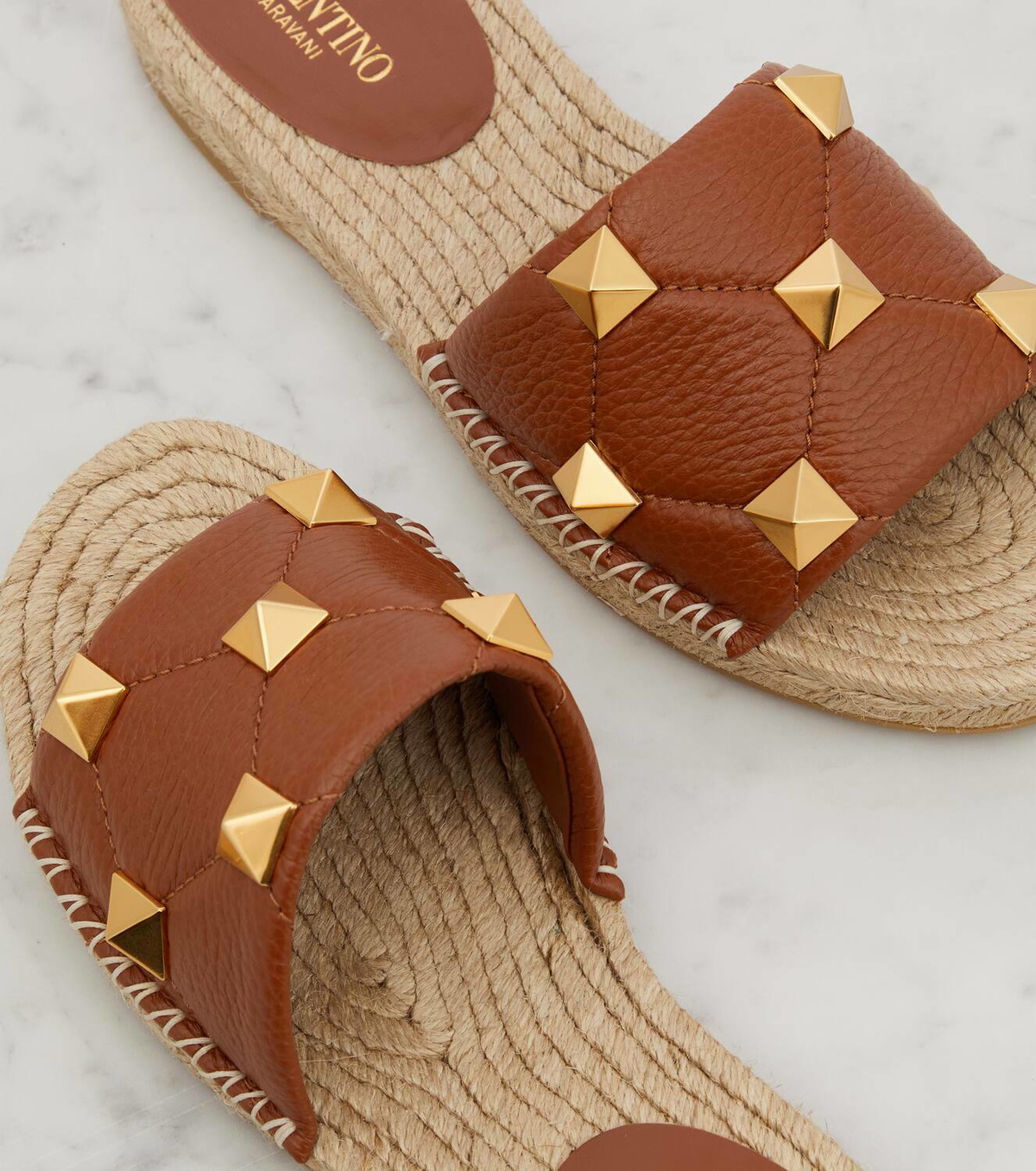 Valentino Garavani Roman Stud leather and raffia slides Valentino Garavani