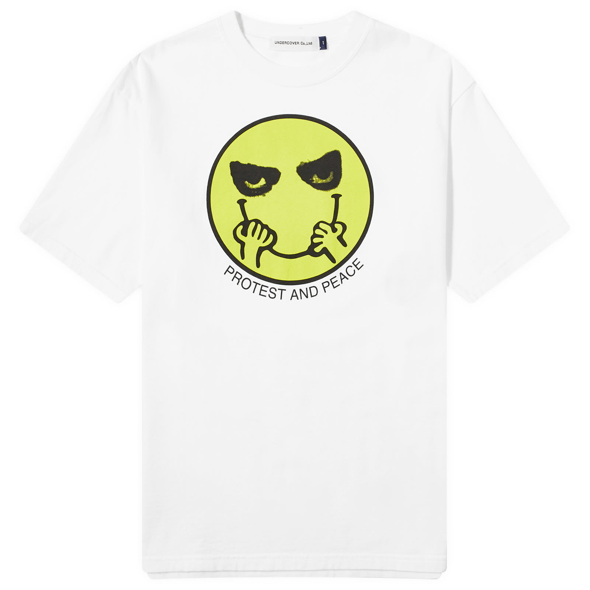 Undercover Women's Simley Propaganda T-Shirt in White Undercover