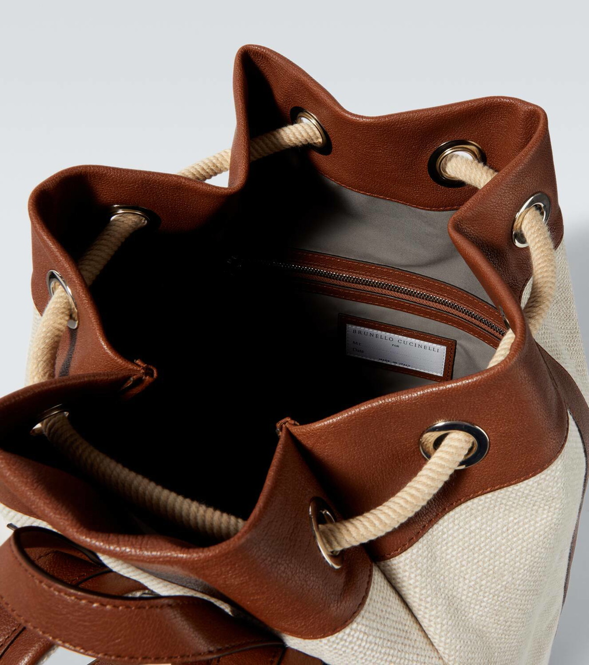 Brunello Cucinelli Leather-trimmed canvas backpack Brunello Cucinelli