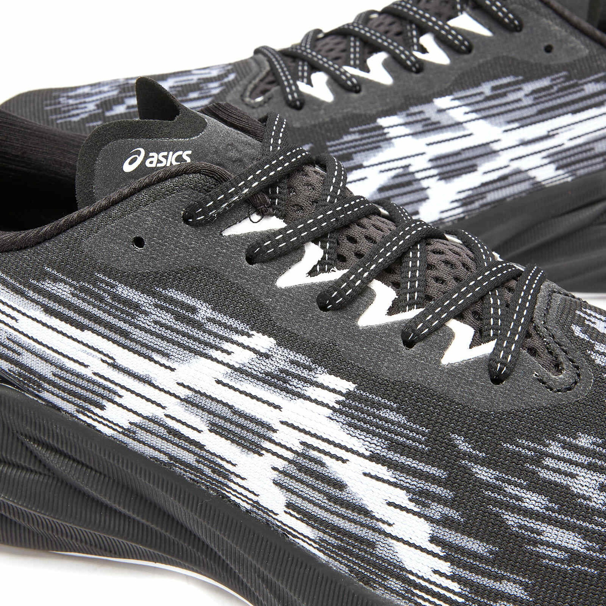 Asics Running Men's Novablast 3 Sneakers in Black/White ASICS