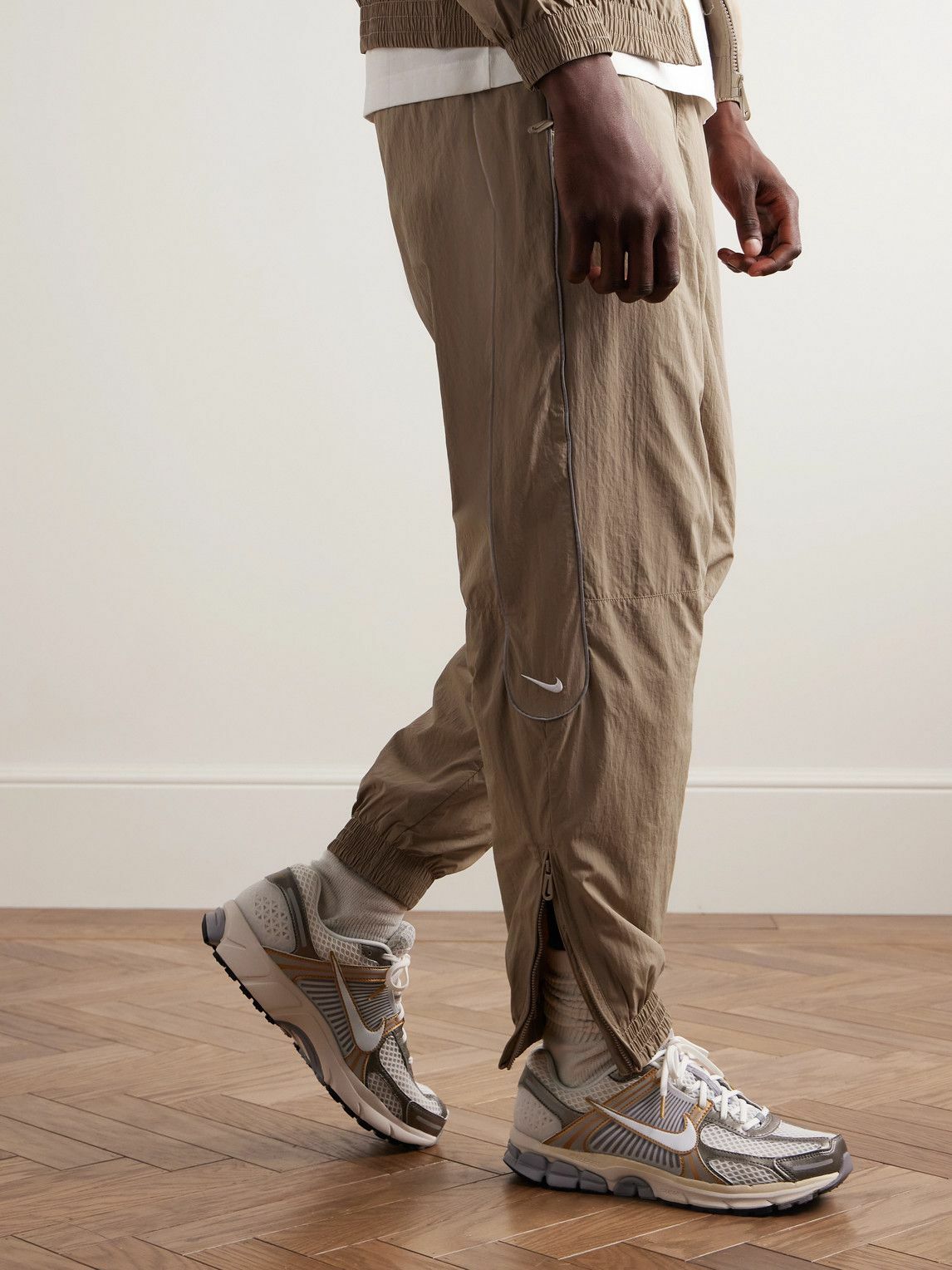 Nike - Solo Swoosh Tapered Logo-Embroidered Nylon Track Pants - Brown Nike