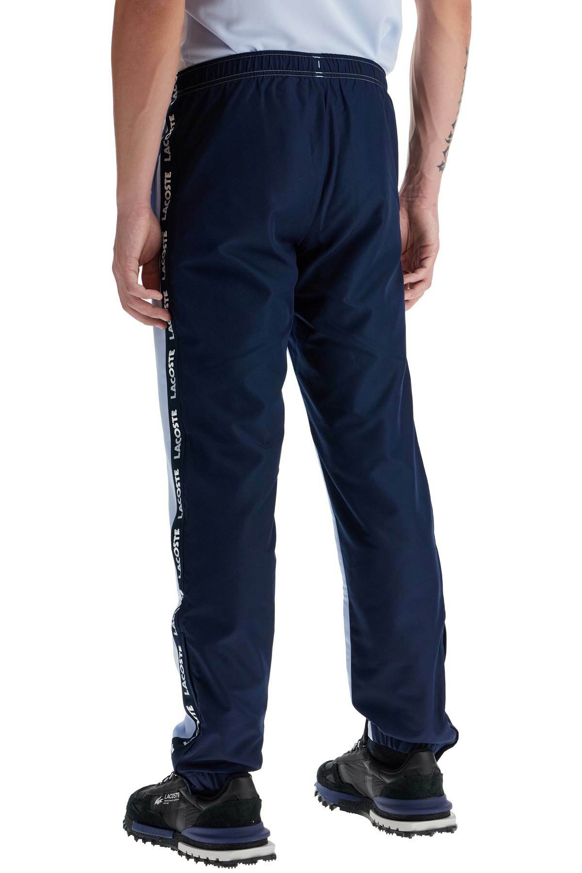 LACOSTE with logo and color block design Blue Lacoste