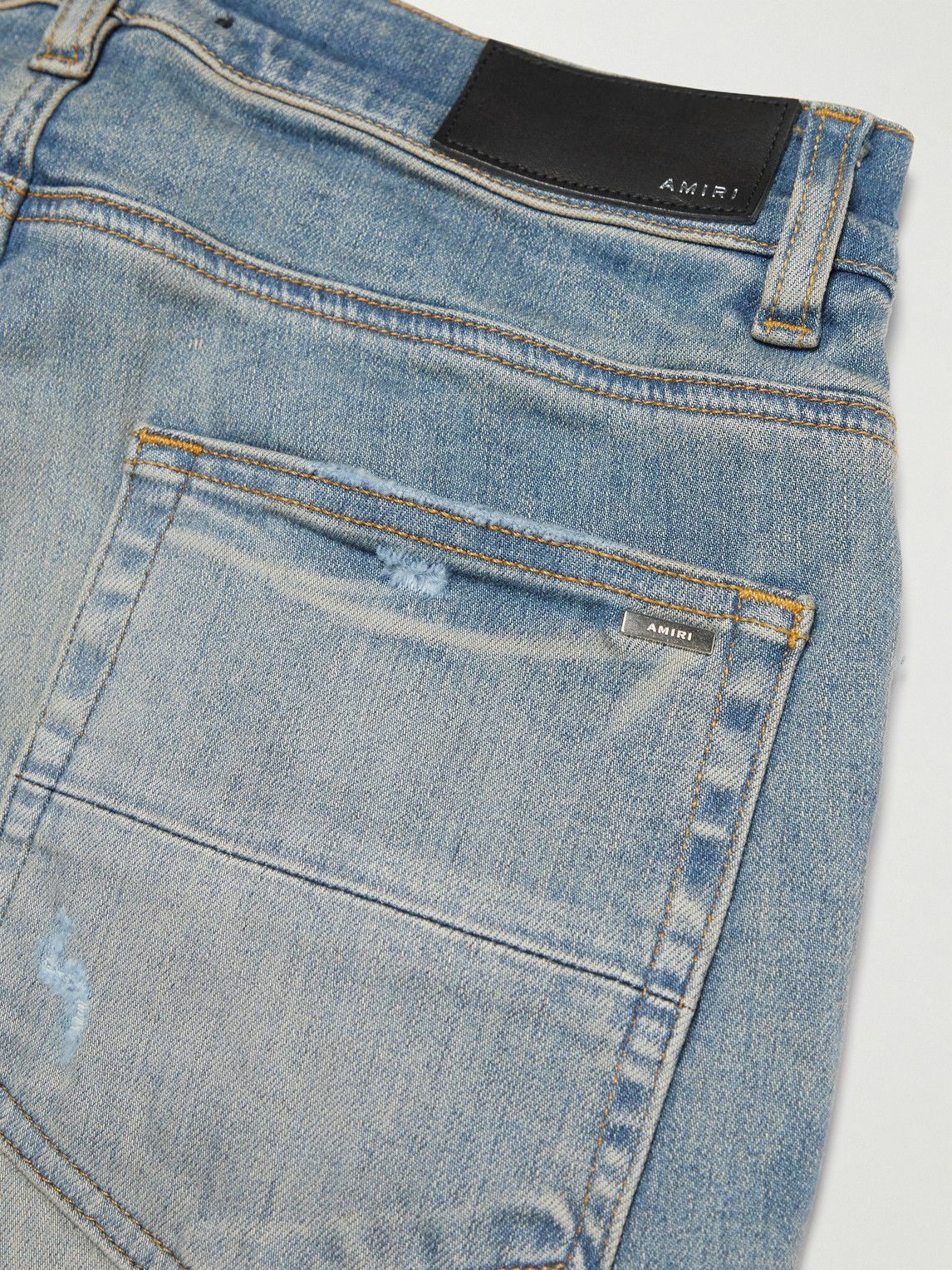 AMIRI - Skinny-Fit Appliquéd Distressed Jeans - Blue Amiri