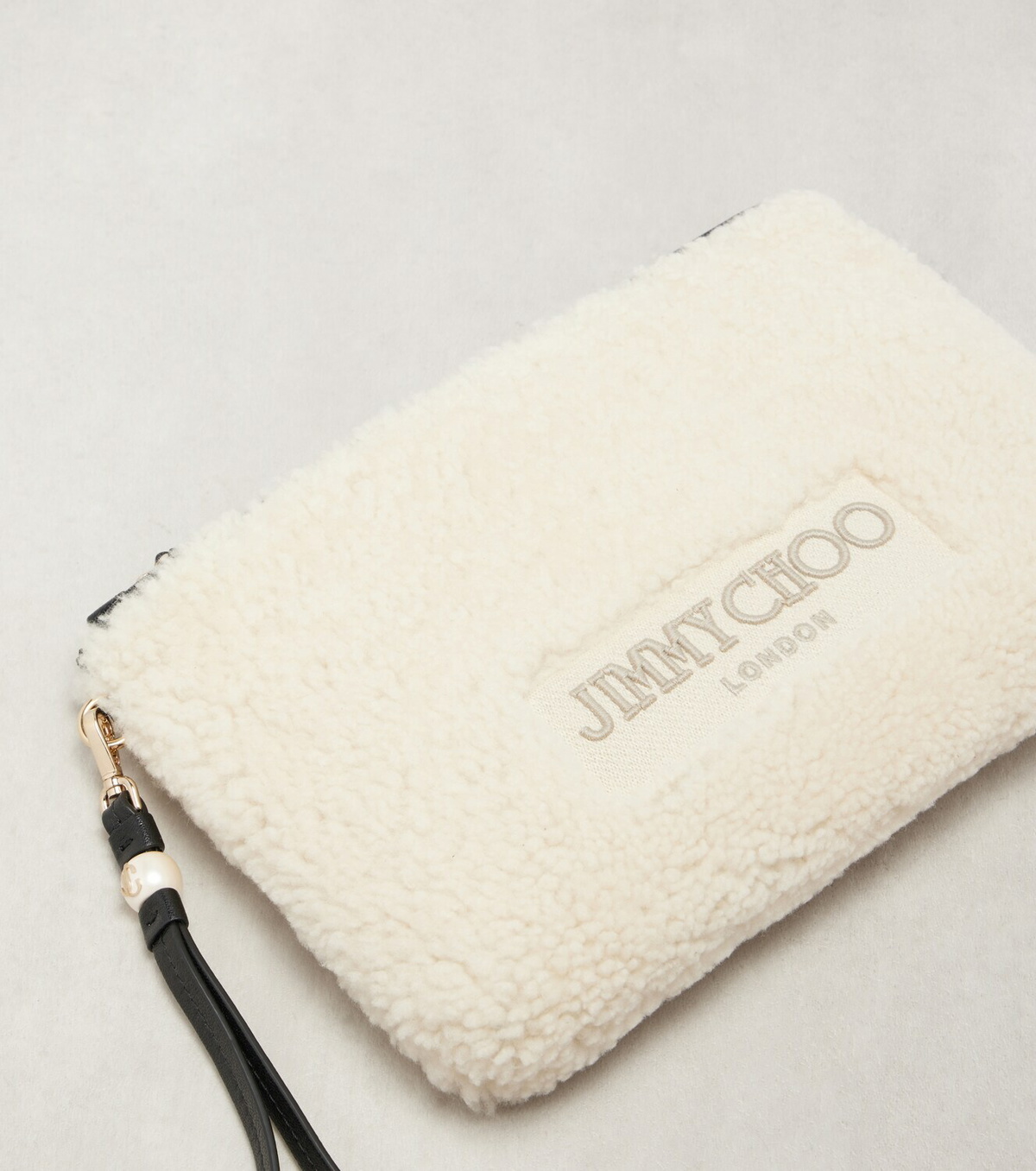 Jimmy Choo Logo shearling pouch with strap Jimmy Choo