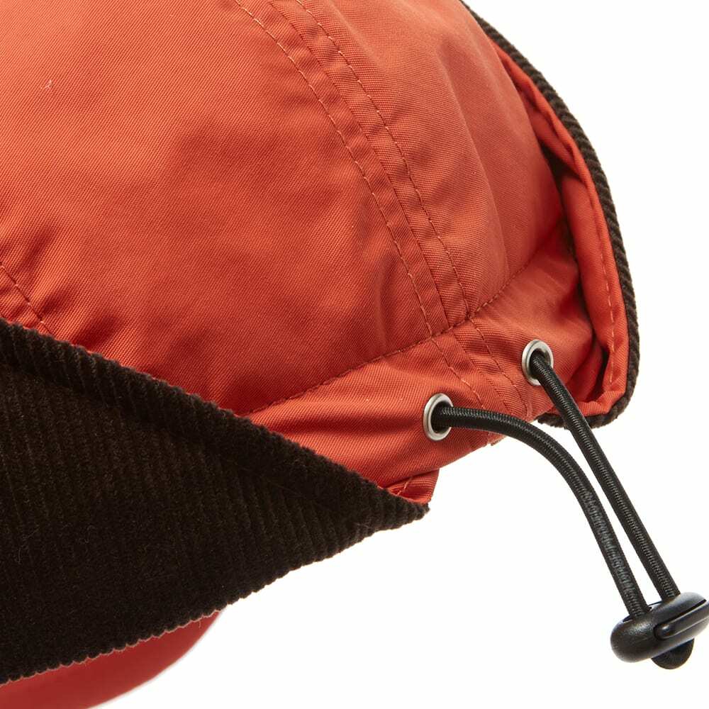 Norse Projects Men's Gore-Tex Infinium Flap Cap in Burnt Orange Norse ...