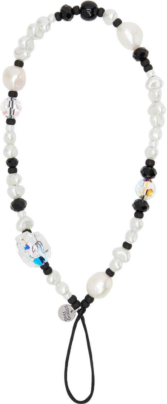 String Ting Black & White Crystal Skull Magic Phone Wristlet
