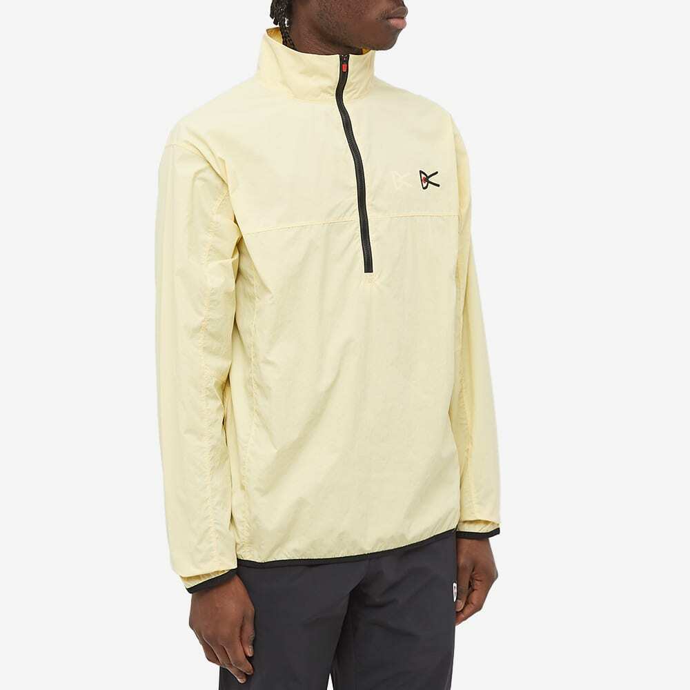 District Vision Men's Theo Shell Jacket in Yellow District Vision