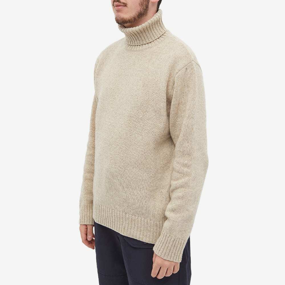 Universal Works Men's Eco Wool Roll Neck Knit in Beige Universal Works