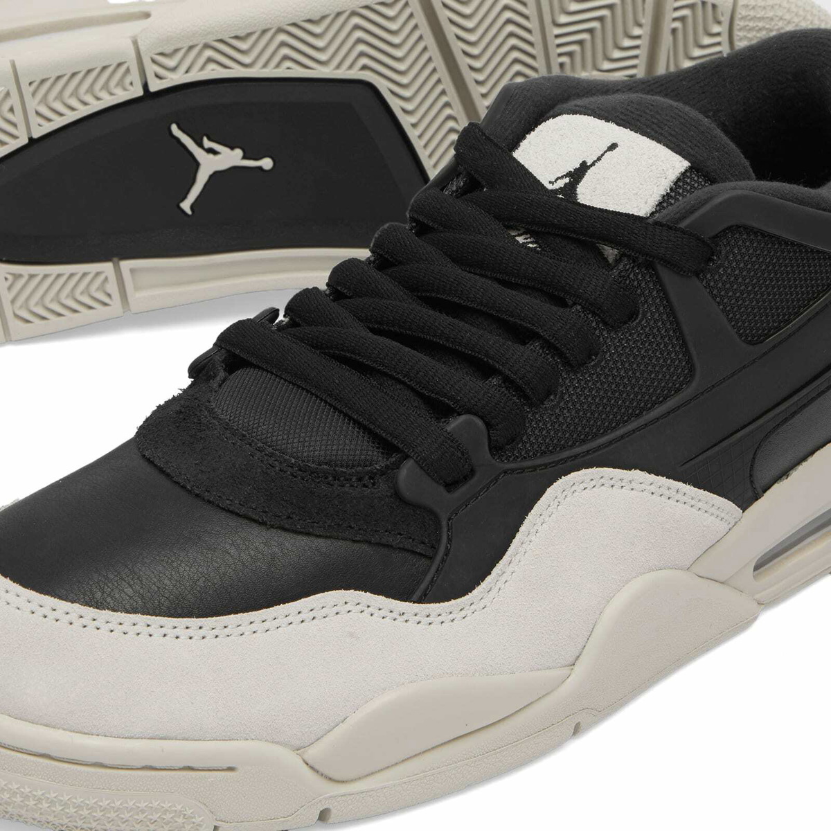 Air Jordan 4 RM Sneaker in Black/Bone/Grey Nike Jordan Brand