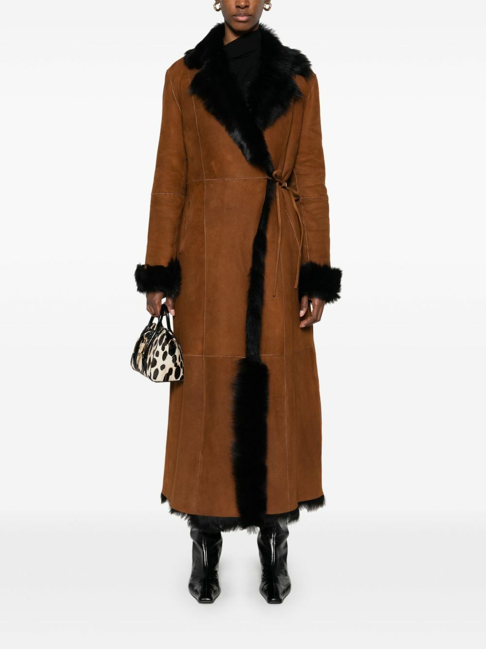Take A Look About Nour Hammour Coat