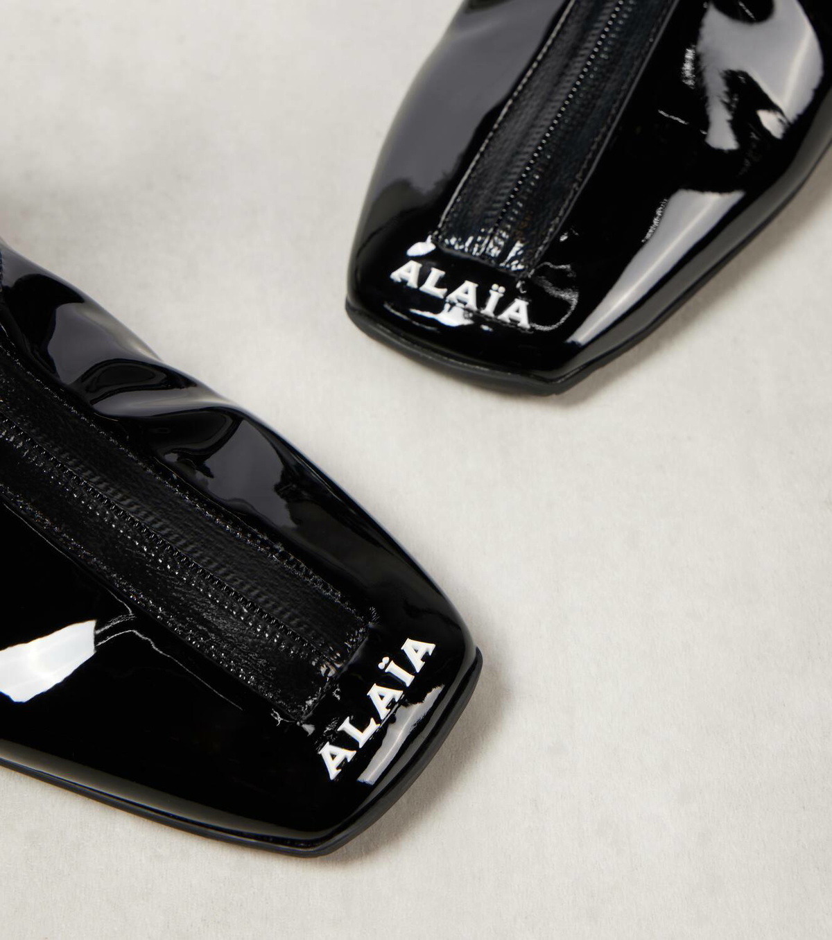 Alaïa Sneaker faux patent leather ankle boots ALAÏA Alaïa Sneaker faux patent leather ankle boots ALAÏA