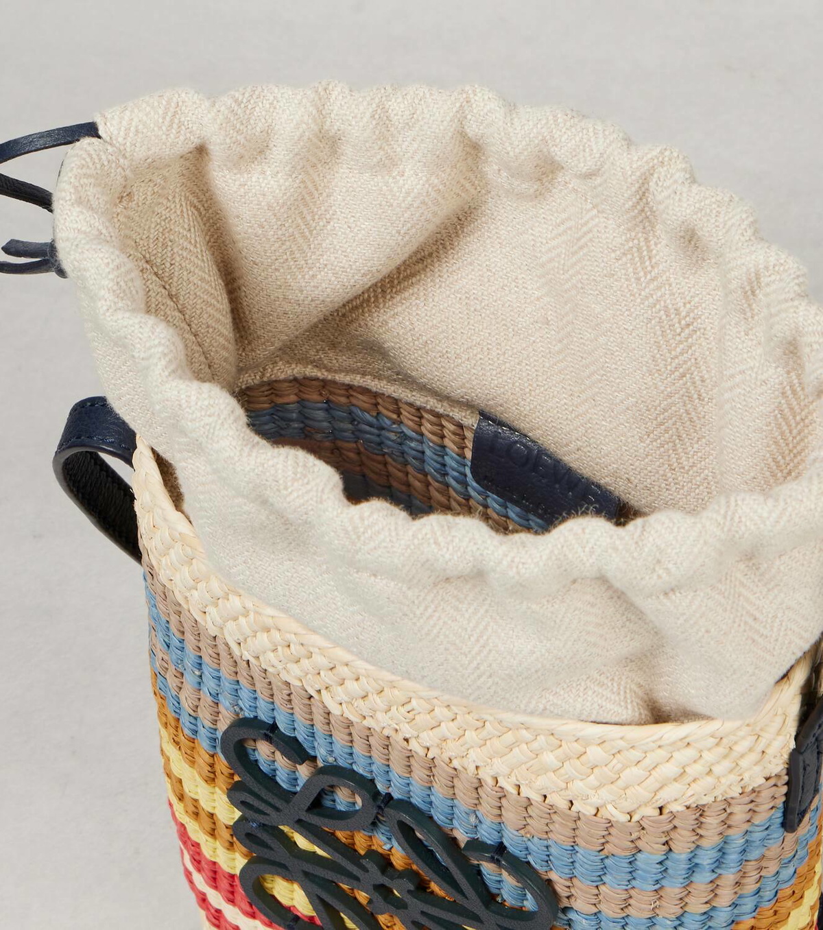 Loewe Anagram striped raffia phone pouch Loewe
