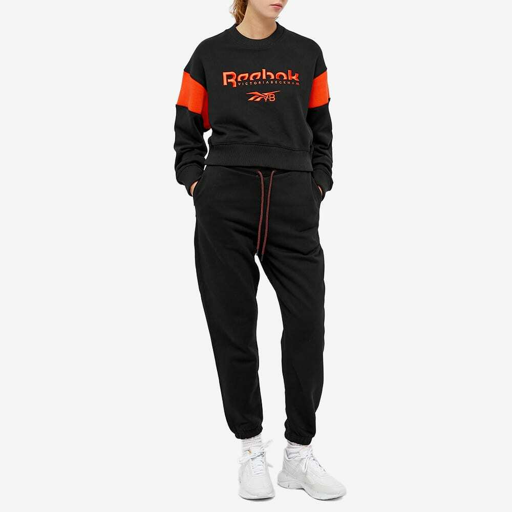 Reebok Women's Slim Sweat Pants in Black/Ultimaora Reebok