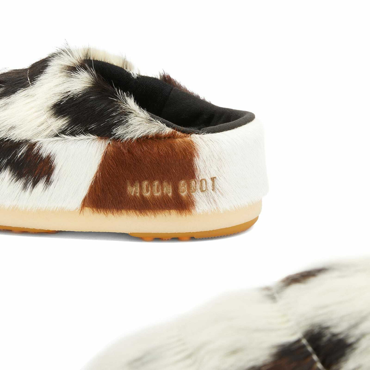 Moon Boot Women's Pony Skin Mules in Cow Print Moon Boot